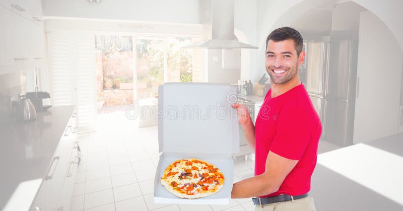 Pizza Man. Cheerful Young Deliveryman Holding a Pizza Box while Stock ...