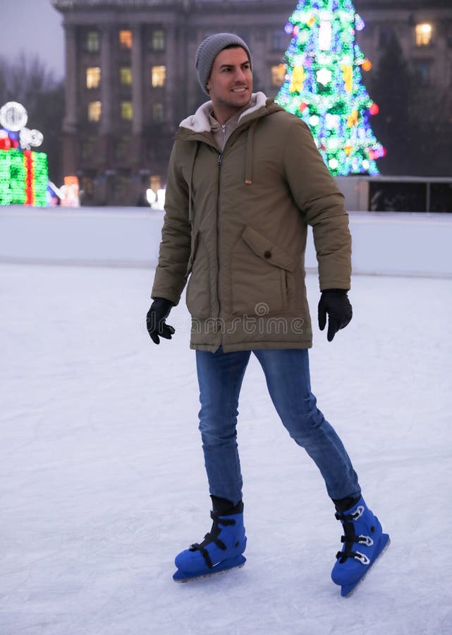 Happy Man Skating at Outdoor Ice Rink Stock Photo - Image of cool ...