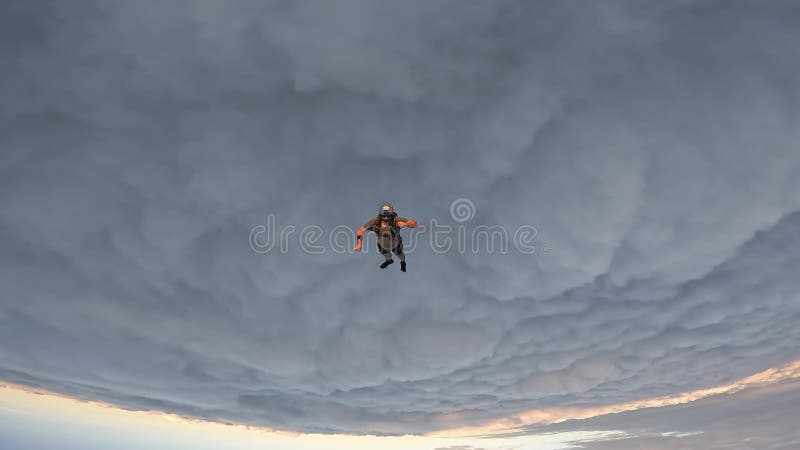 Happy Man Skydiving Over the Clouds at Sunset. Stock Footage - Video of ...
