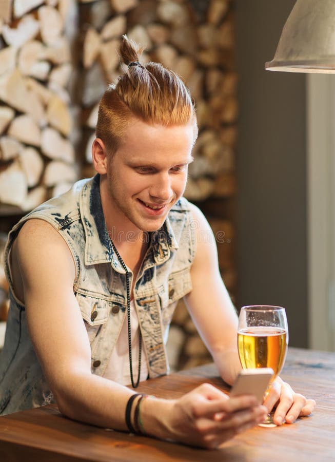 Happy Man with Smartphone Drinking Beer at Bar Stock Photo - Image of ...