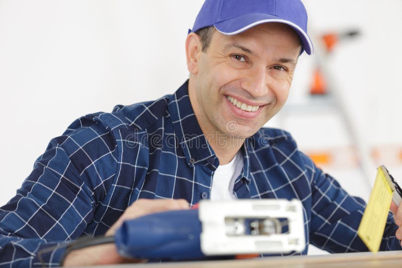 Happy Man Spending Time in Woodworking Workshop Stock Photo - Image of ...