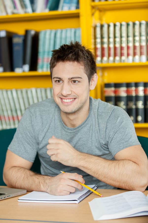 Happy man studying stock image. Image of school, indoors - 73373055