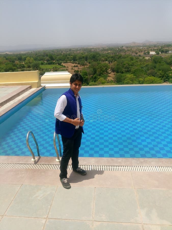 Happy man by swimming pool stock photo. Image of swimming - 93195390