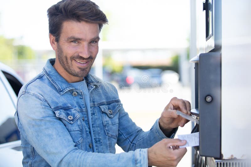 Happy Man Taking Ticket To Pass Control on Parking Area Stock Photo ...