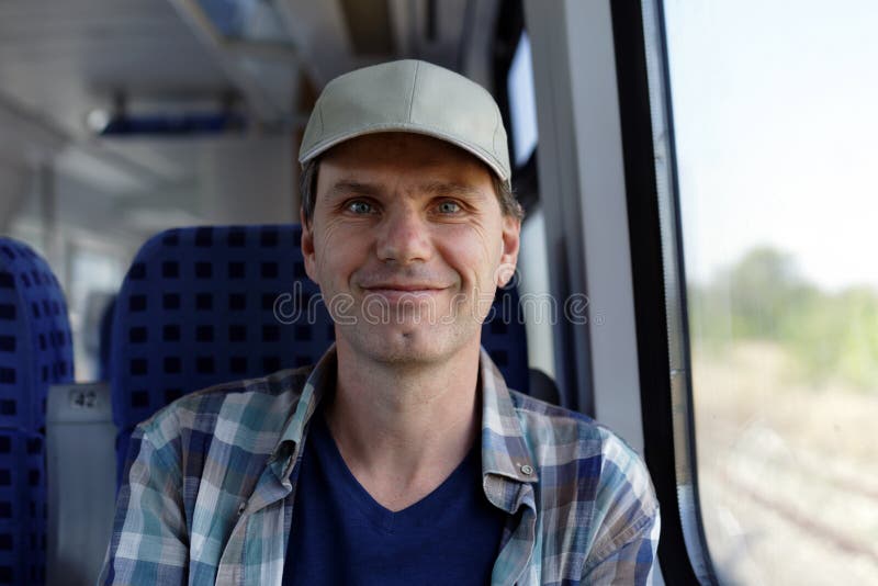 Happy man in a train stock photo. Image of blue, person - 88824980