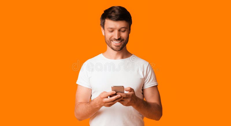 Happy Man Using Cellphone Over Yellow Background, Panorama Stock Image ...