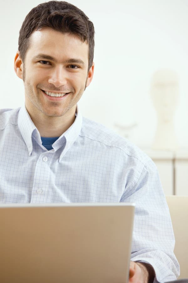 Happy Entrepreneur Man Near Laptop Computer Posing in Modern Office ...
