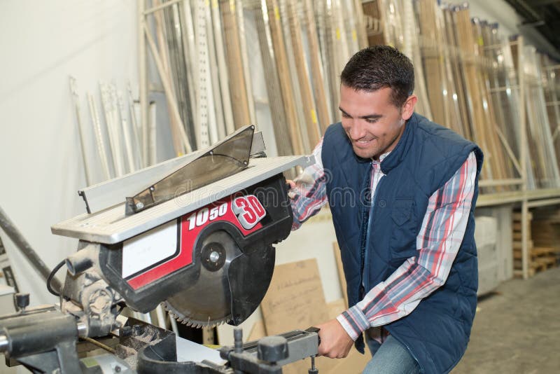 Happy Man Using Sawing Circular Saw Stock Photos - Free & Royalty-Free ...