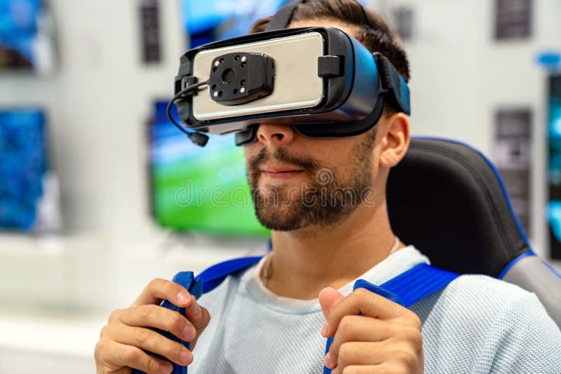 Happy Man Using VR Goggles and Enjoying Virtual Reality Game ...