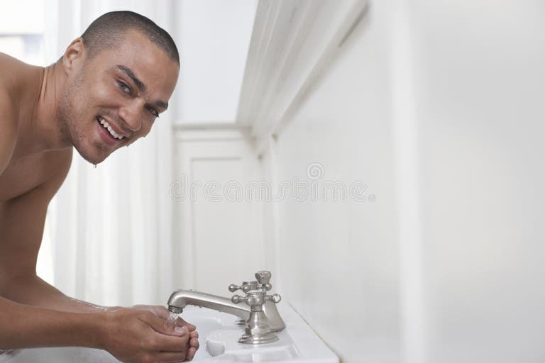 Happy Man Washing Face stock image. Image of face, caucasian - 29656963
