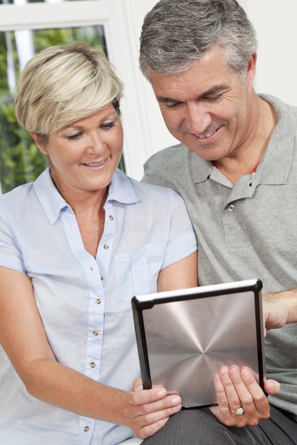 Happy Man & Woman Couple Using Tablet Computer Stock Image - Image of ...