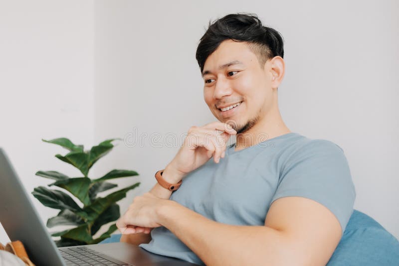 Happy Man Work with Computer Laptop while Stay at Home. Work at Home ...