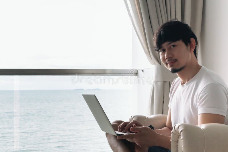 Happy Man Work in the Hotel with Sea View. Staycation Concept. Stock ...