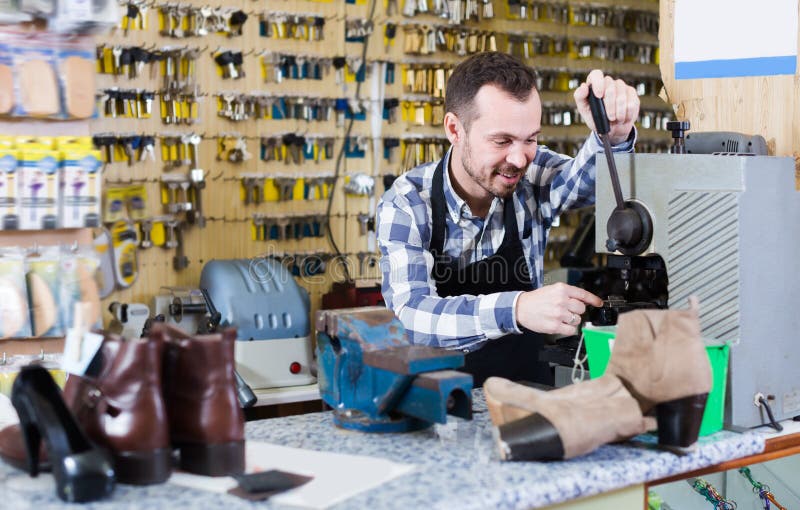 Happy Man Worker Working at Forming Key Stock Image - Image of ...