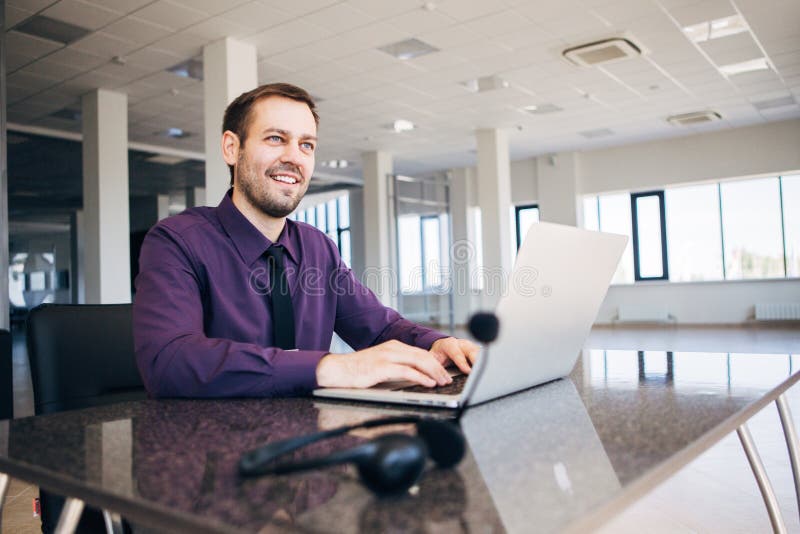 Happy Man Working As an Operator in the Center of the Number Stock ...
