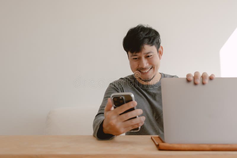 Happy Man Working on Computer Feeling Happy with the App in Mobile ...