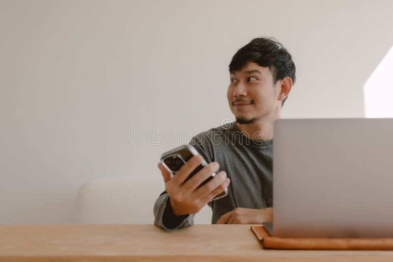 Happy Man Working on Computer Feeling Happy with the App in Mobile ...