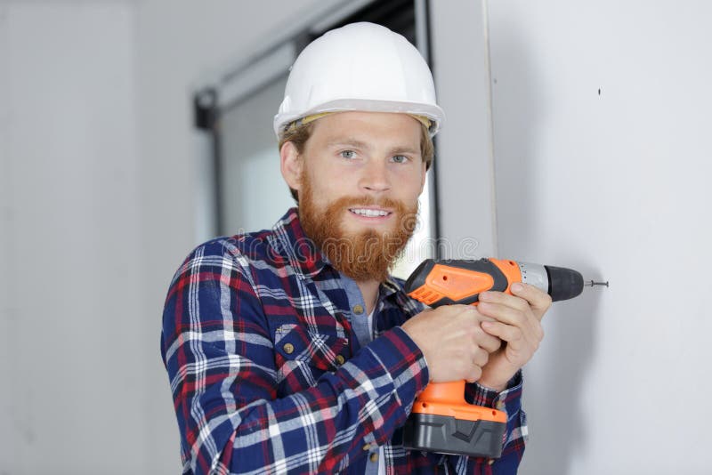 Happy Man Working on Construction Wall Stock Photo - Image of ...
