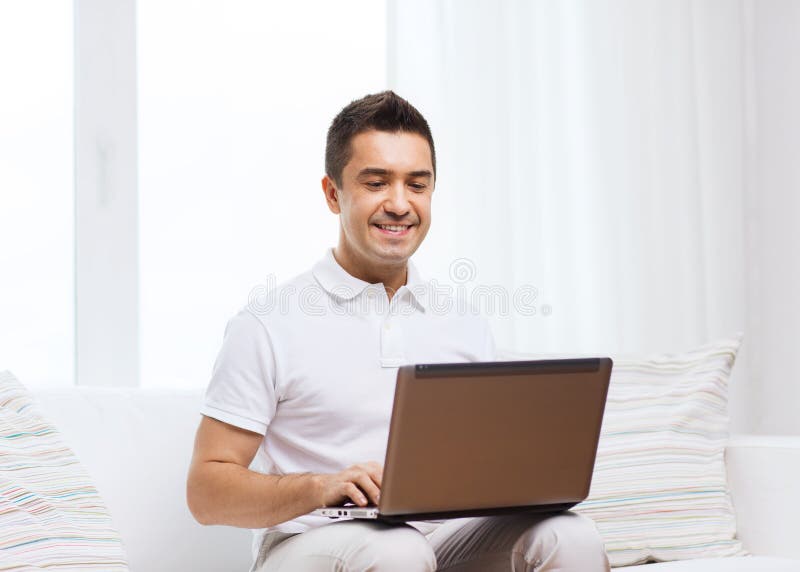 Happy Man Working with Laptop Computer at Home Stock Photo - Image of ...
