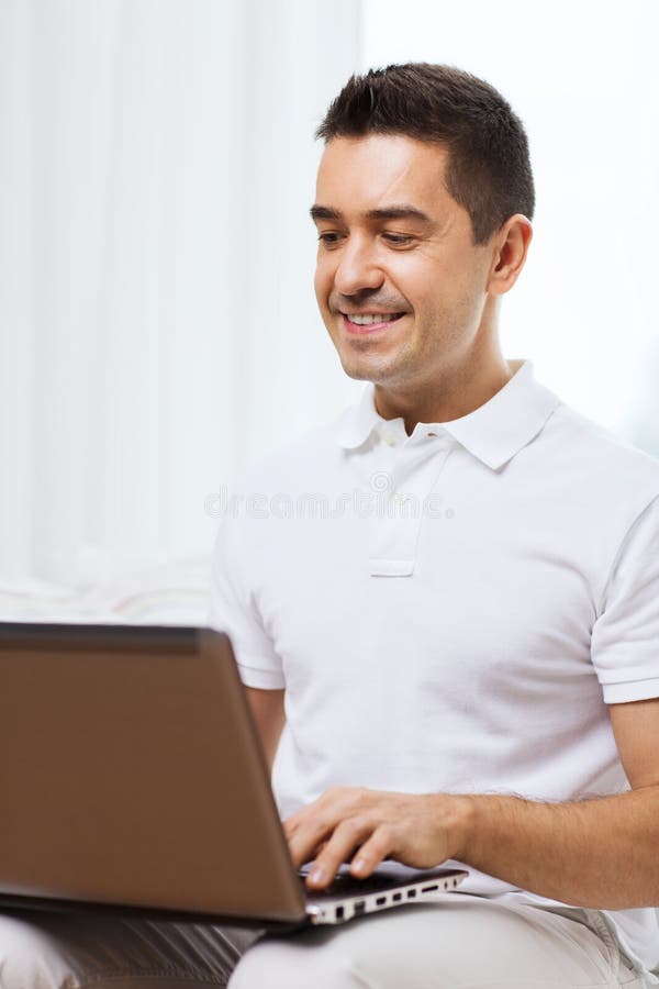 Happy Man Working with Laptop Computer at Home Stock Photo - Image of ...