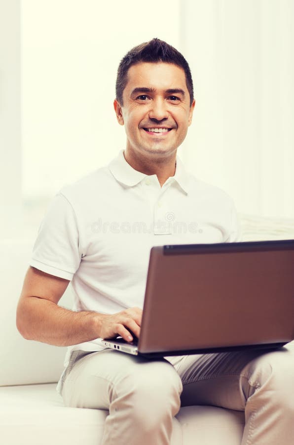 Happy Man Working with Laptop Computer at Home Stock Photo - Image of ...