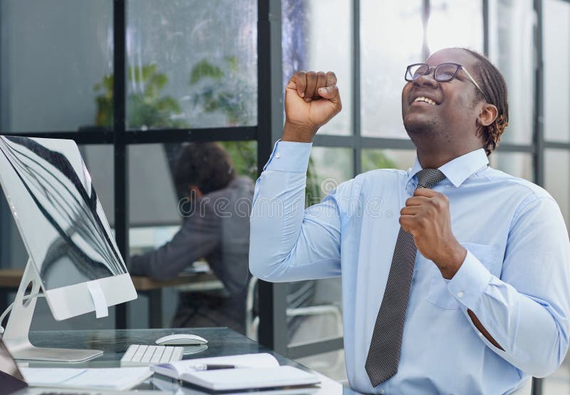 Happy Man Working in the Office. Raised His Hands Joyfully Stock Image ...