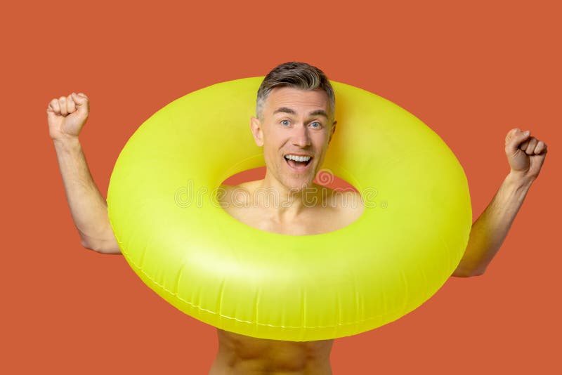 A Happy Man with a Yellow Life Cirlce Stock Photo - Image of lifestyle ...