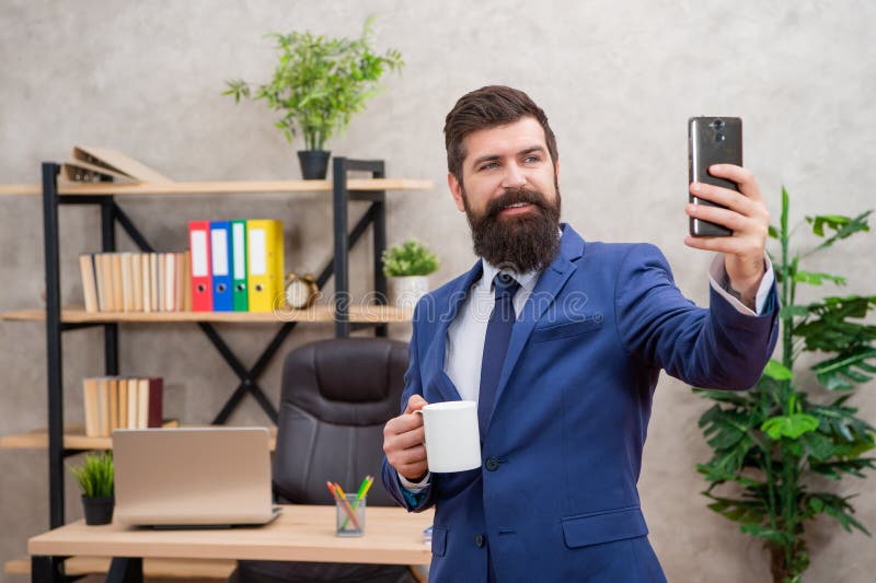 Happy Manager Smiling To Smartphone in Office, Selfie Stock Image ...