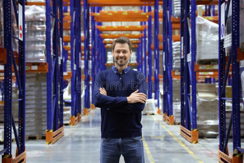 Happy Manager in Warehouse with Lots of Products Stock Image - Image of ...