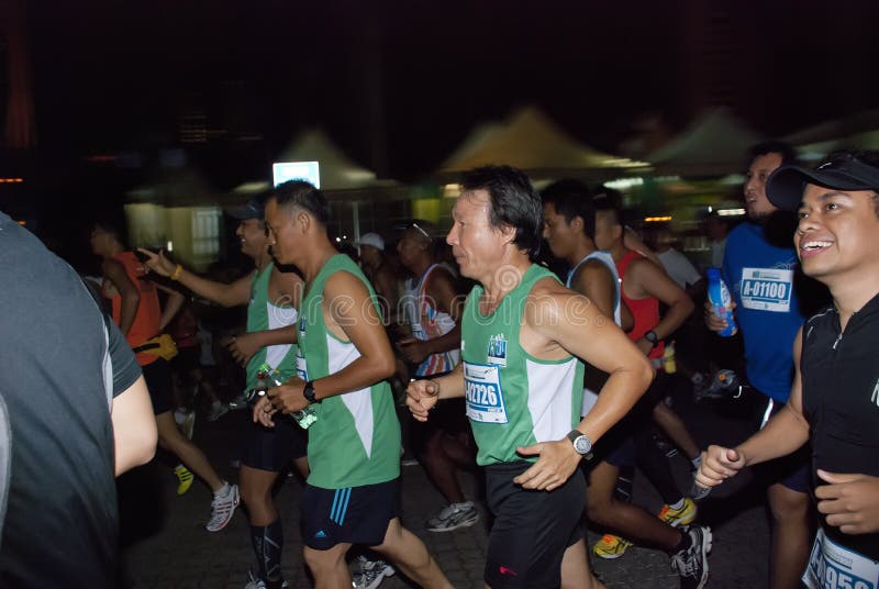 Happy Marathon Runner editorial stock photo. Image of kuala - 20071858