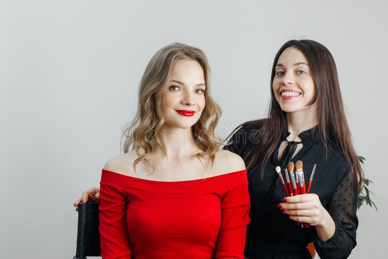 Happy Master with a Beautiful Blonde in a Beauty Salon Stock Image ...
