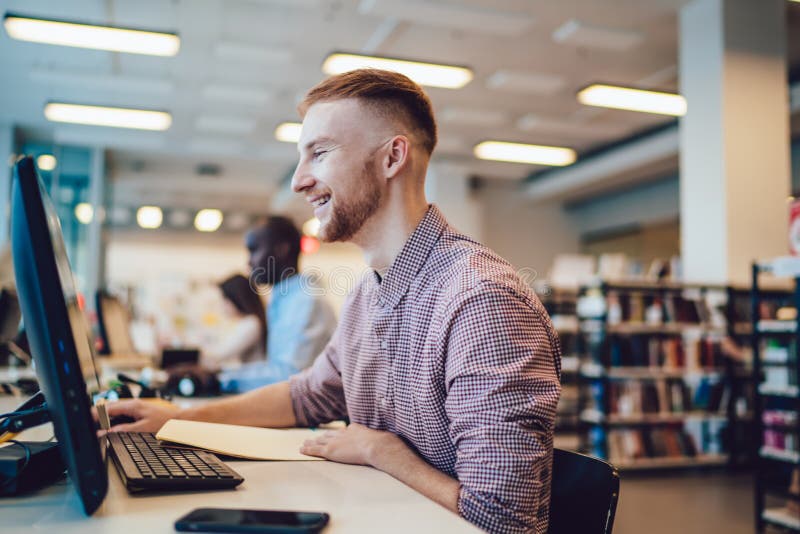 Happy Mates Surfing PC in Library at Table Stock Image - Image of glad ...