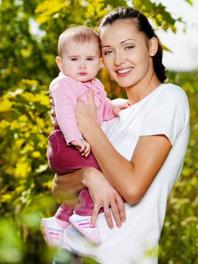 Happy Mather with Attractive Baby Outdoor Stock Photo - Image of ...
