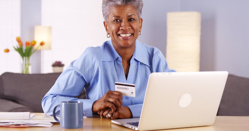Happy Mature Black Woman Holding Credit Card Stock Image - Image of ... Happy Mature Black Woman Holding Credit Card Stock Image - Image of ...