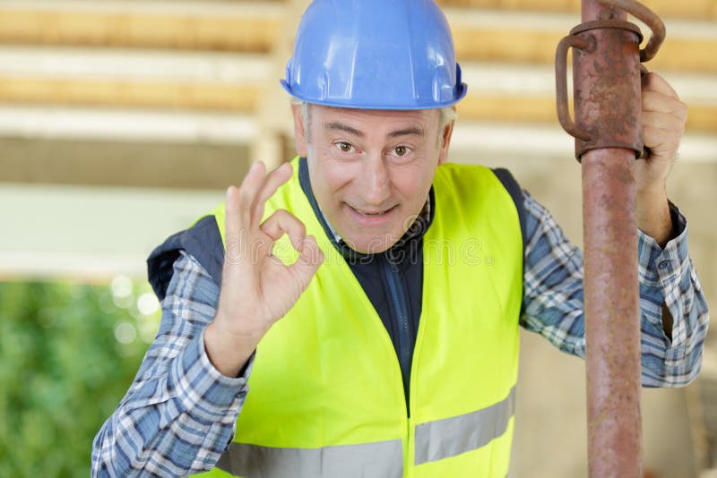 Builder Smiling Confident Standing at Construction Site Stock Image ...