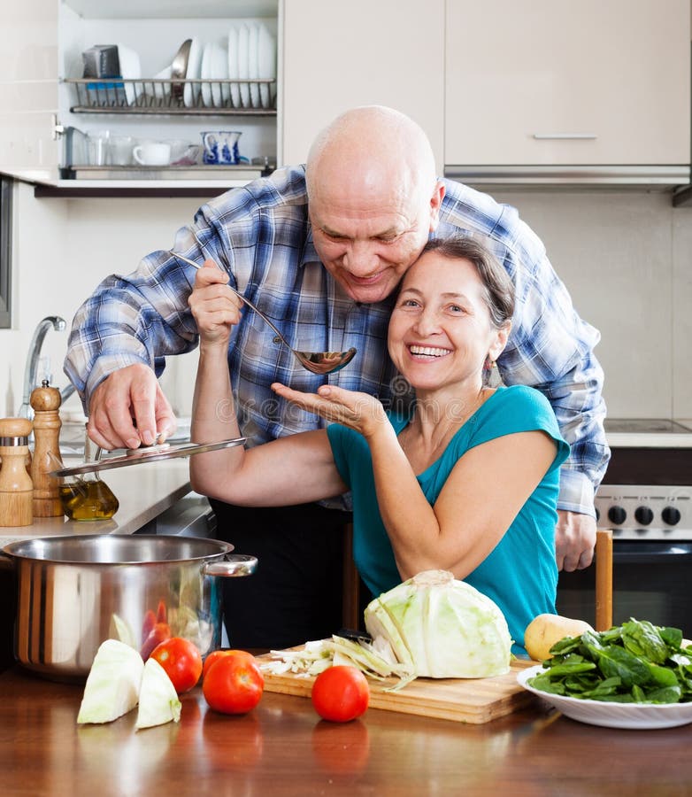 Ordinary Mature Couple Cooking Together Stock Photos - Free & Royalty ...