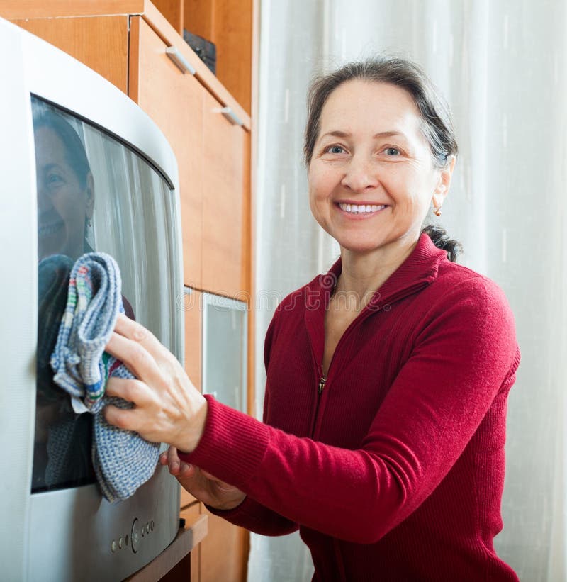 Mature Woman Dusting Tv Stock Photos - Free & Royalty-Free Stock Photos ...