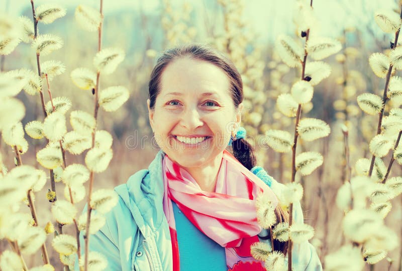 Happy Mature Woman in Spring Stock Image - Image of nature, plant: 89545699