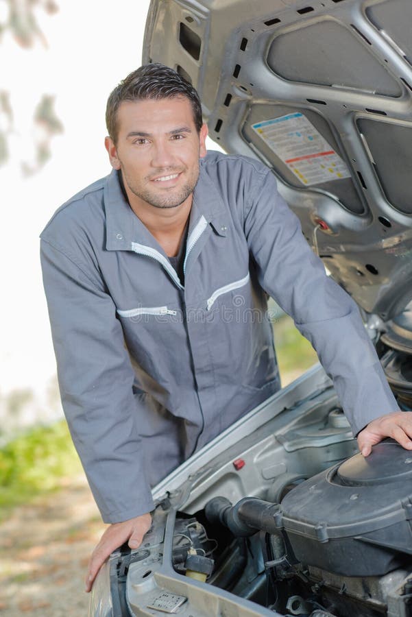 Happy mechanic at work stock image. Image of work, engine - 197918099