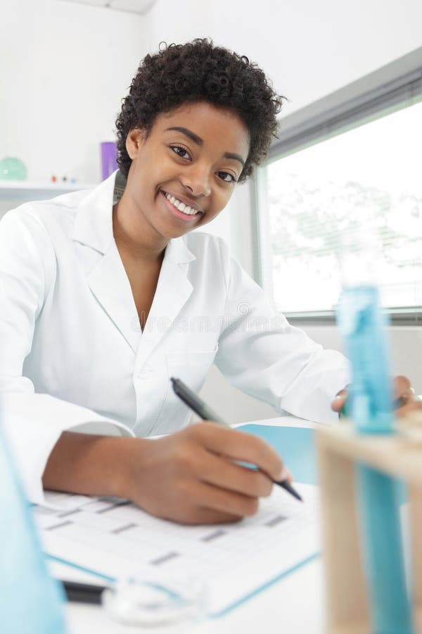 Happy Medical Student Taking Notes for Research Stock Photo - Image of ...