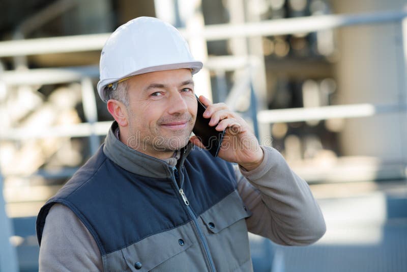 Happy Man Engineer Using Mobile Contact Stock Photo - Image of outdoor ...