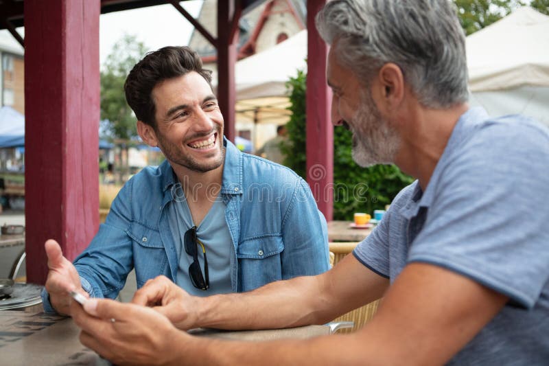 Happy Men Friends Talking Together Stock Photo - Image of friendship ...