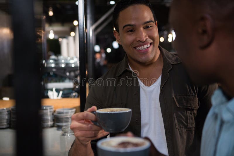 Happy Man Interacting while Having Coffee Stock Image - Image of coffee ...