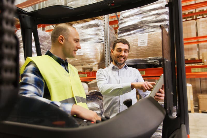 Happy Men with Tablet Pc and Forklift at Warehouse Stock Image - Image ...