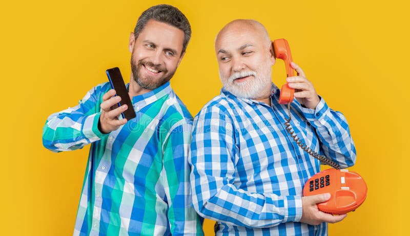 Happy Men with Vs Technology Isolated on Yellow. Happy Men with Vs ...
