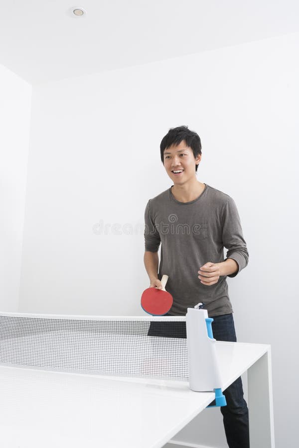 Happy Mid Adult Man Playing Ping Pong Stock Photo - Image of lifestyle ...