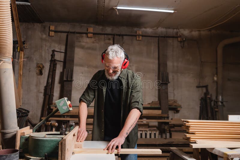 Happy Middle Aged Carpenter Working on Stock Photo - Image of equipment ...