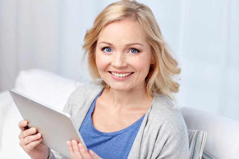 Happy Middle Aged Woman with Tablet Pc at Home Stock Image - Image of ...