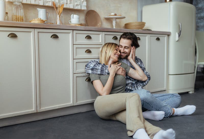 Happy Millennial Caucasian Husband And Wife Hugs Enjoy Tender Moment