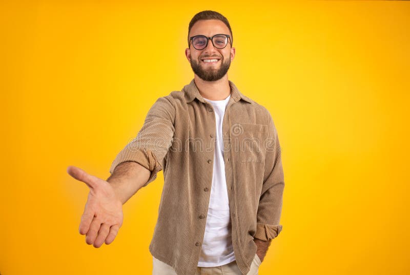 Happy Millennial Caucasian Man With Beard In Casual And Glasses Give